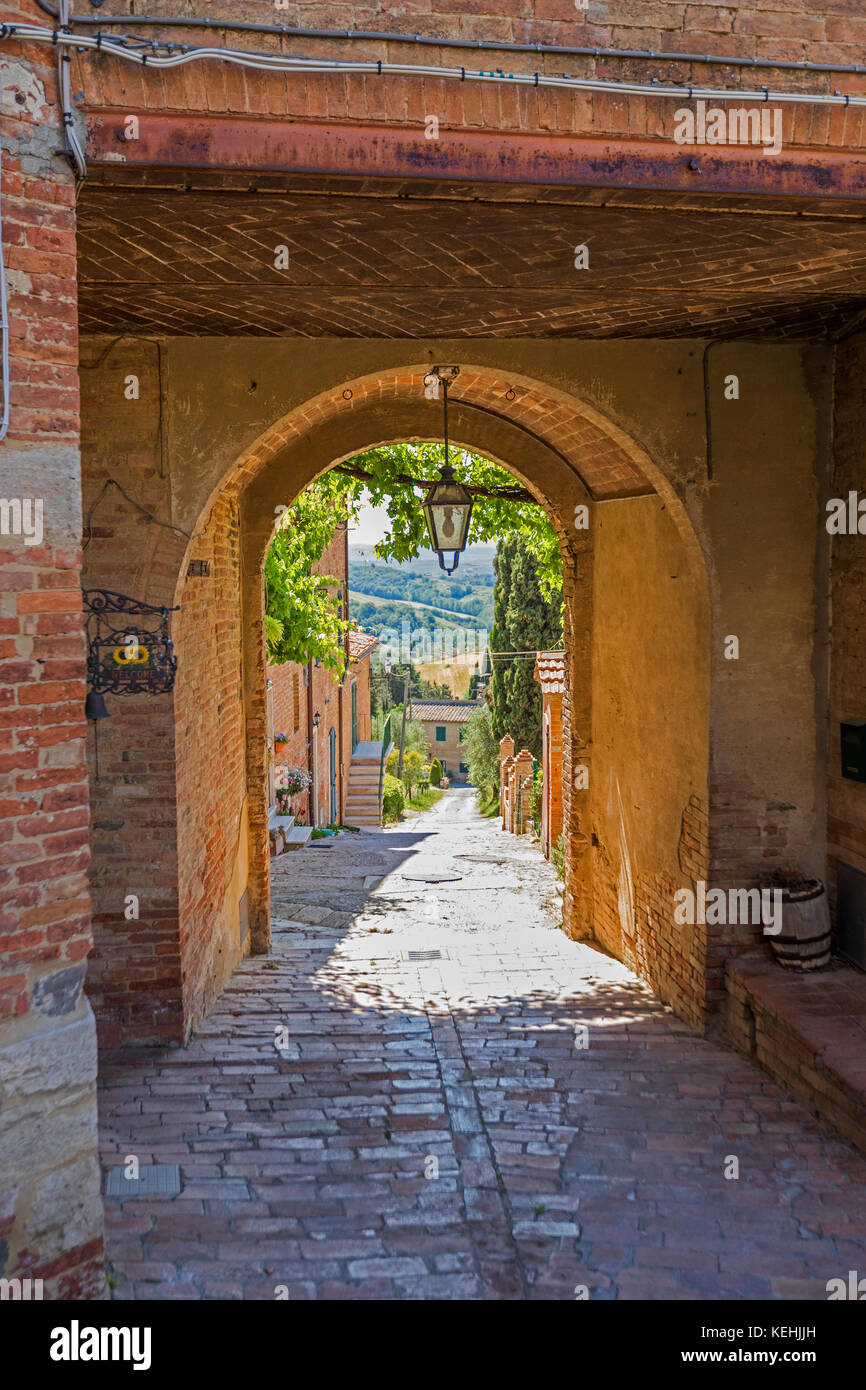 Arch over sidewalk in city Stock Photo - Alamy