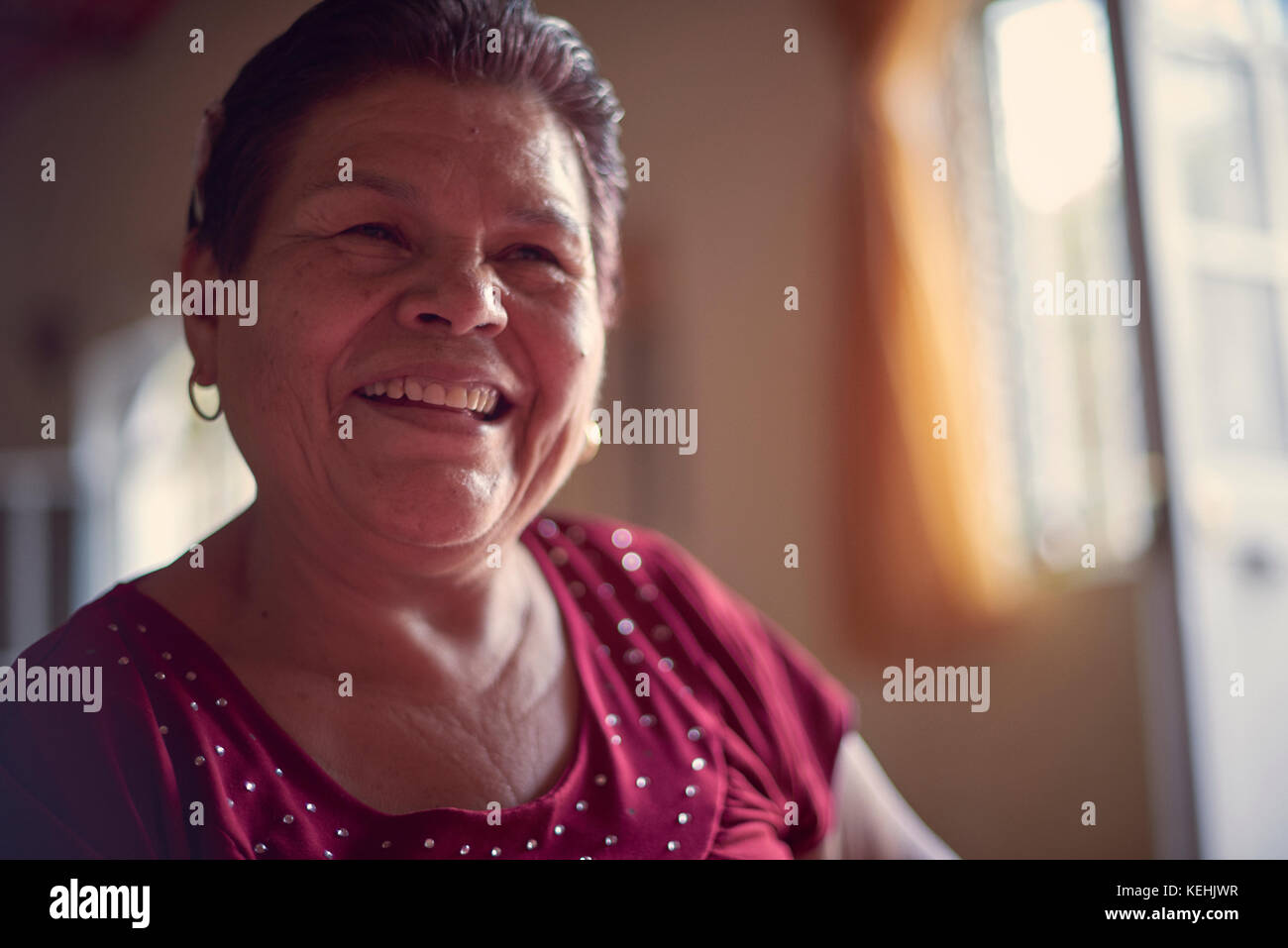 Smiling Hispanic woman Stock Photo - Alamy