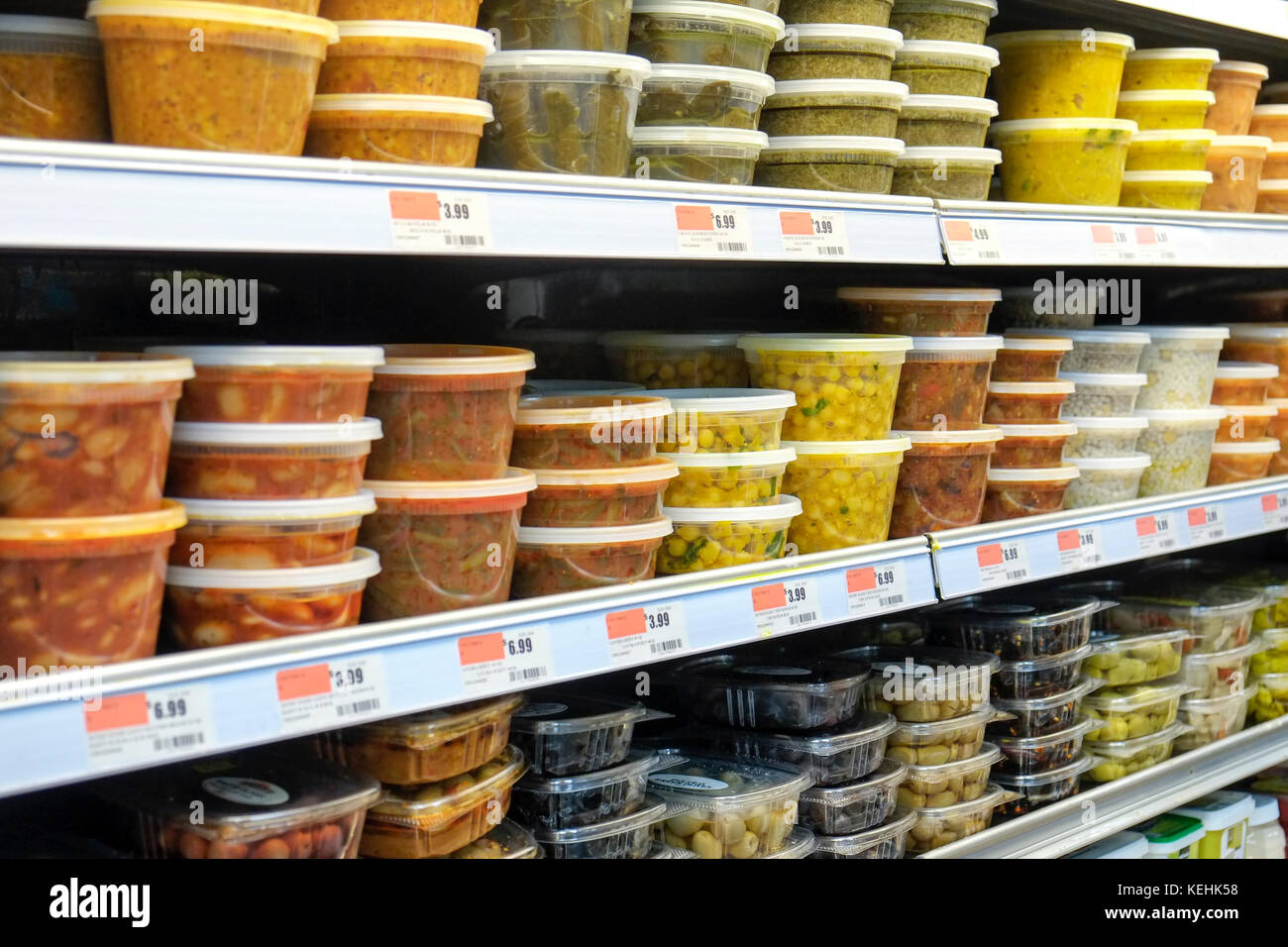 Plastic containers of food on supermarket shelves Stock Photo - Alamy