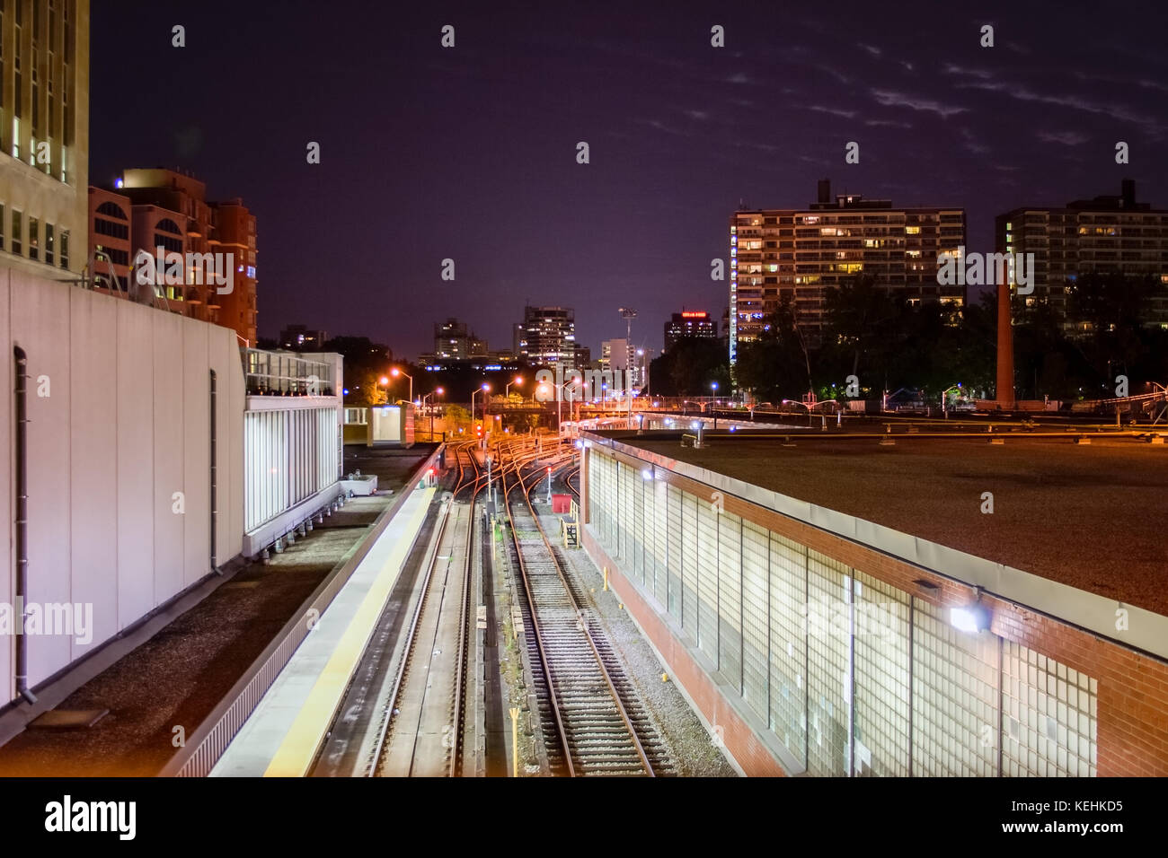 Subway Railroad and Station at Night Stock Photo - Alamy
