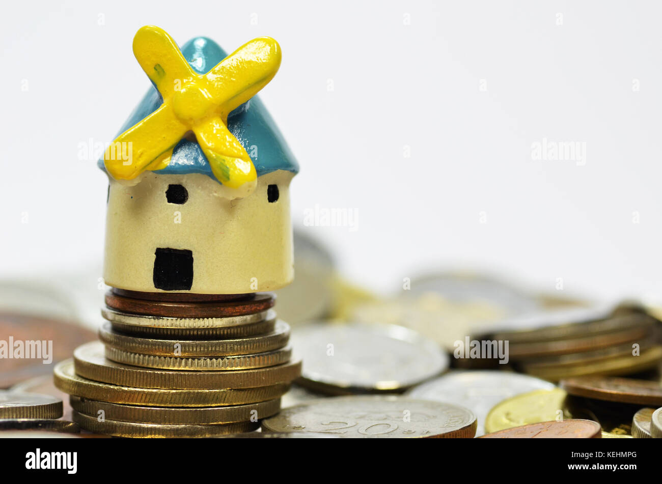Mortgage concept by money house from coins Stock Photo - Alamy