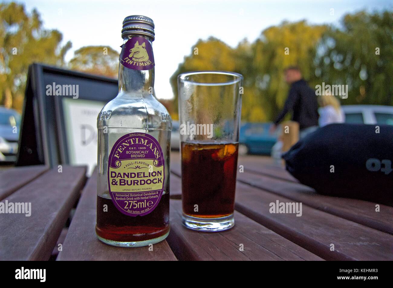 Bottle of Fentiman's Dandelion and Burdock drink with half full glass ...