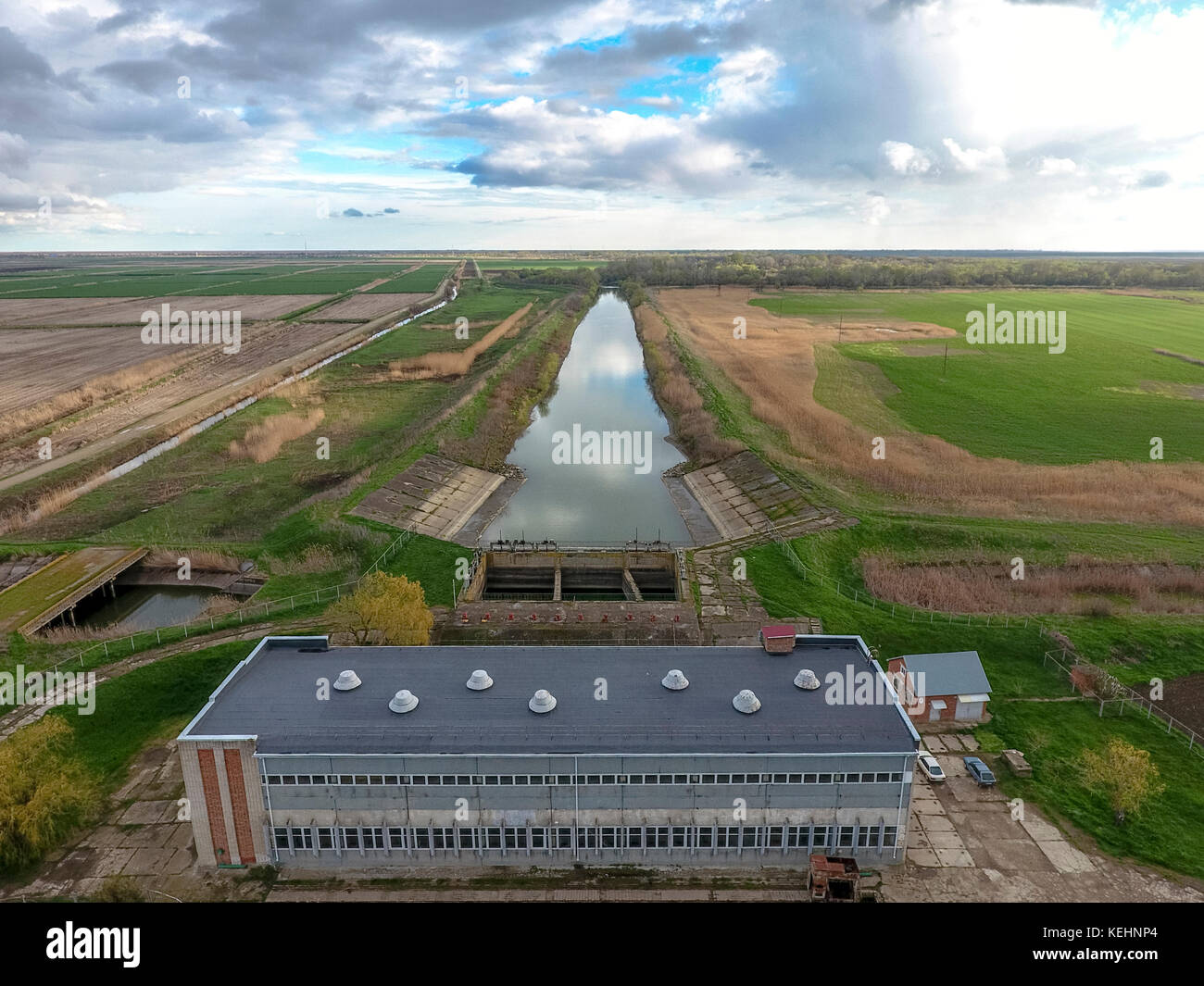 Water pumping station of irrigation system of rice fields. View from ...