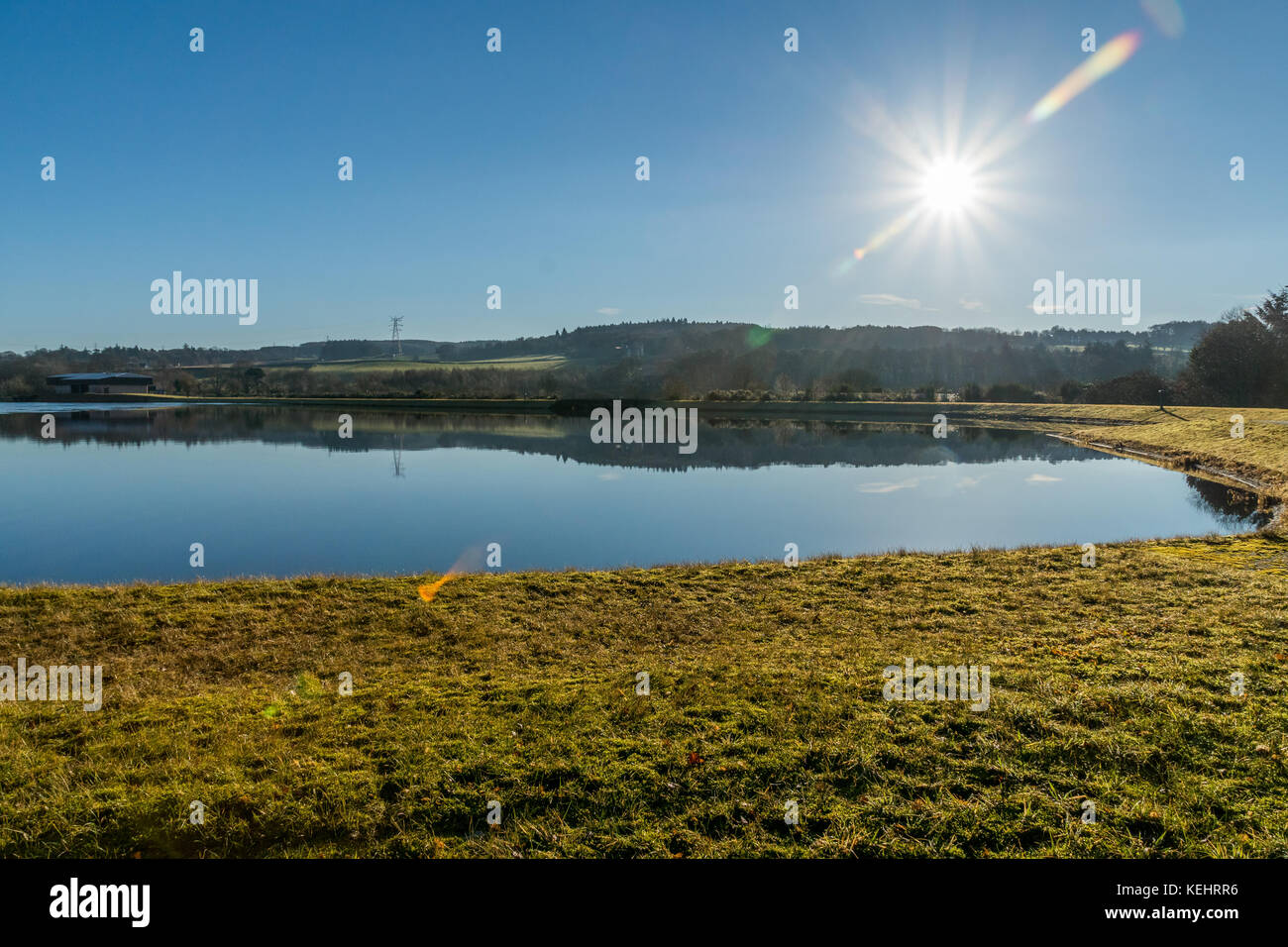 Inchgarth reservoir bank and water Stock Photo - Alamy