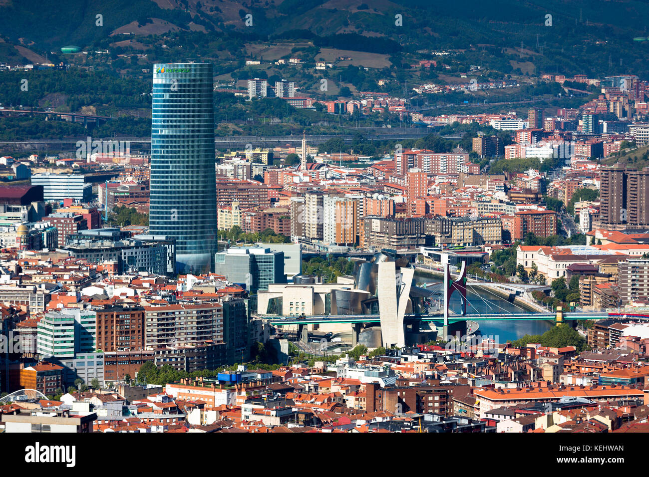 Aerial view of Bilbao Guggenheim Museum, Iberdrola Tower skyscraper and ...