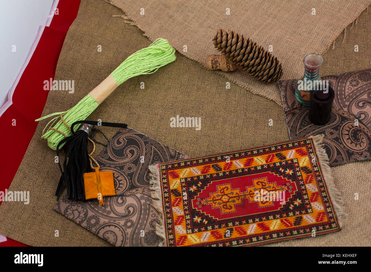 Sewing textile or cloth. Gold scissors pin cushion, and natural white ...