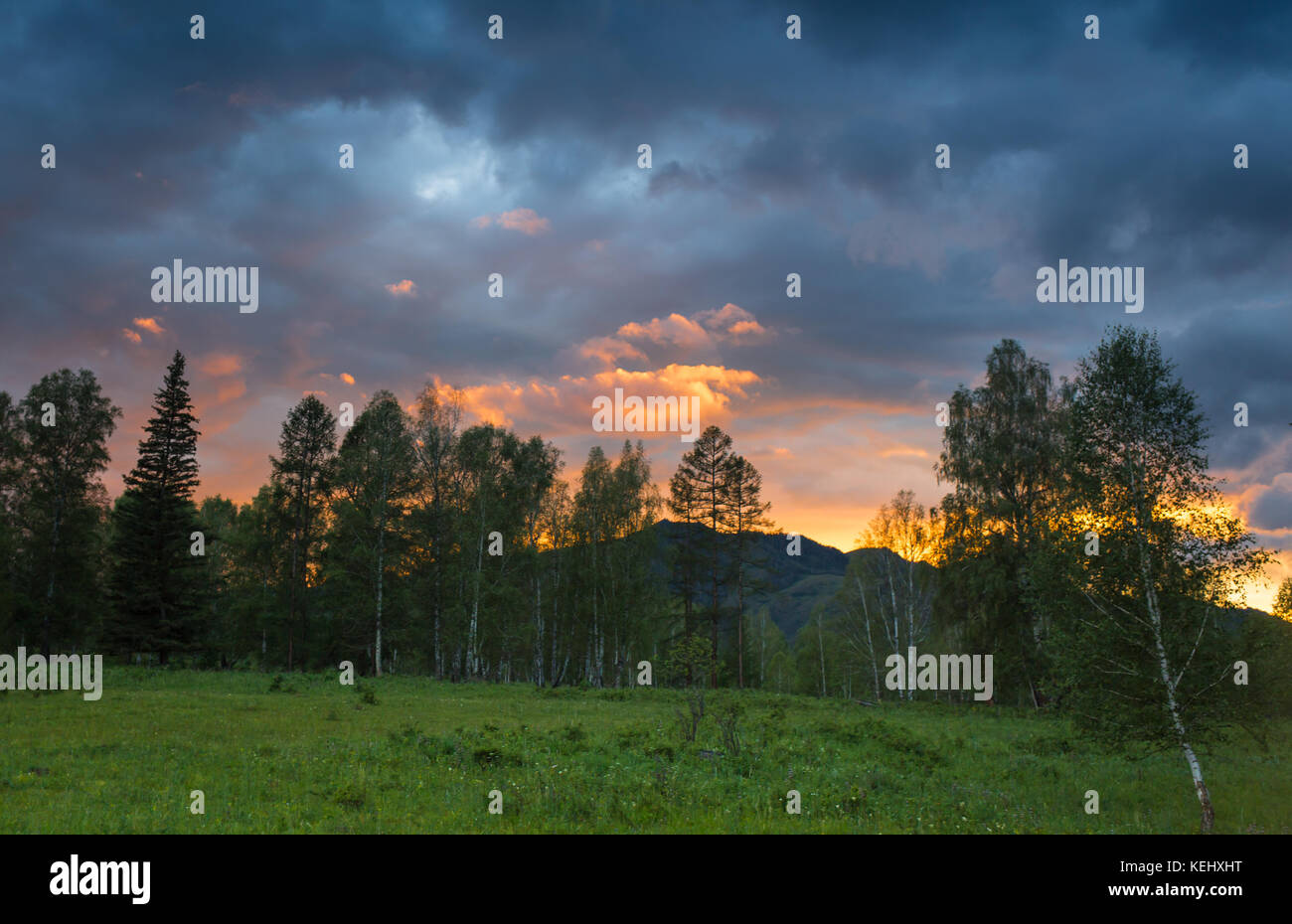 Beautiful dramatic sunset in the mountains. Landscape with sun light ...