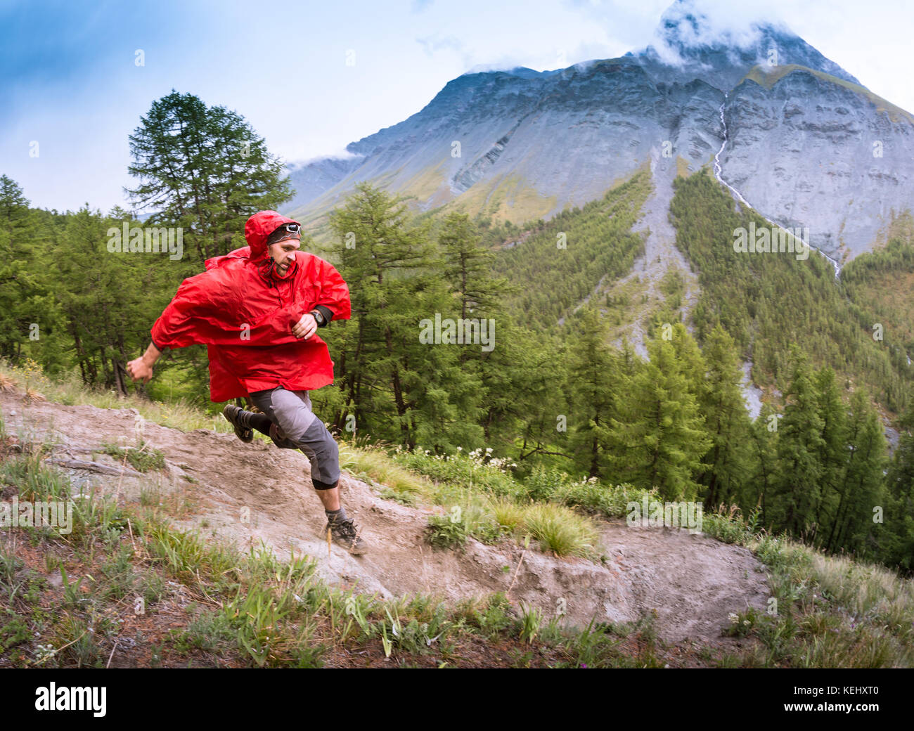 Man trail running in the mountain in Altai, Russia Stock Photo - Alamy