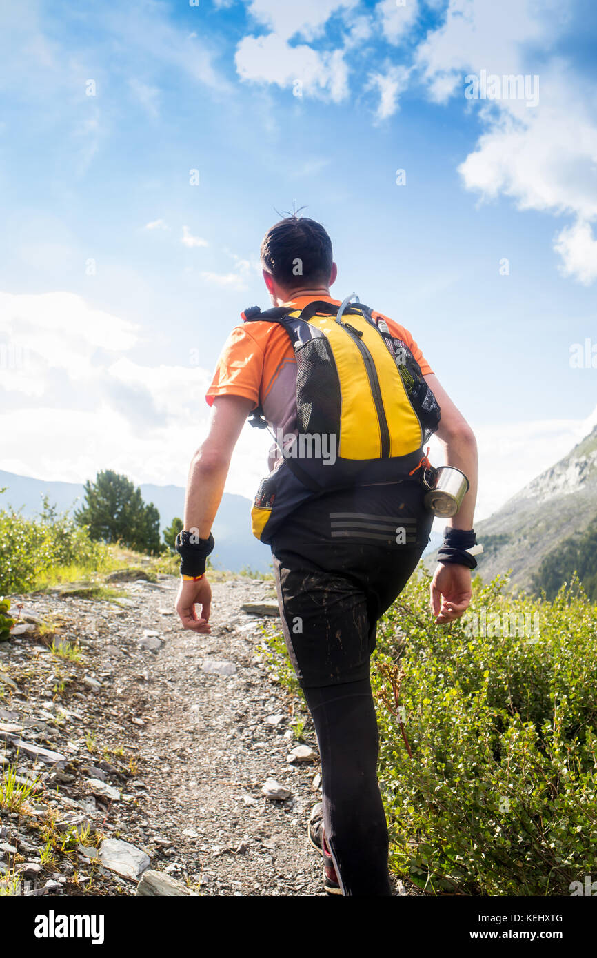Man trail running in the mountain in Altai, Russia Stock Photo - Alamy