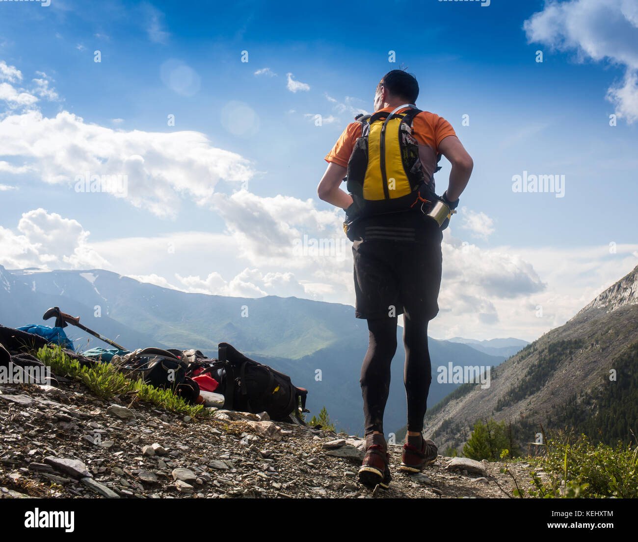 Man trail running in the mountain in Altai, Russia Stock Photo - Alamy