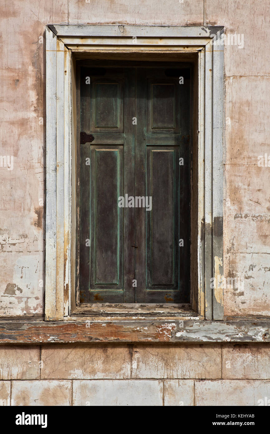 Window with closed shut panels from a Roman house facade Stock Photo ...