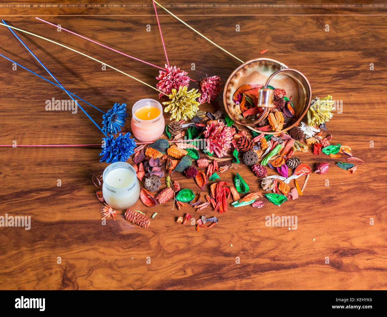 aromatherapy background with dry flowers and aromatic candles on table ...