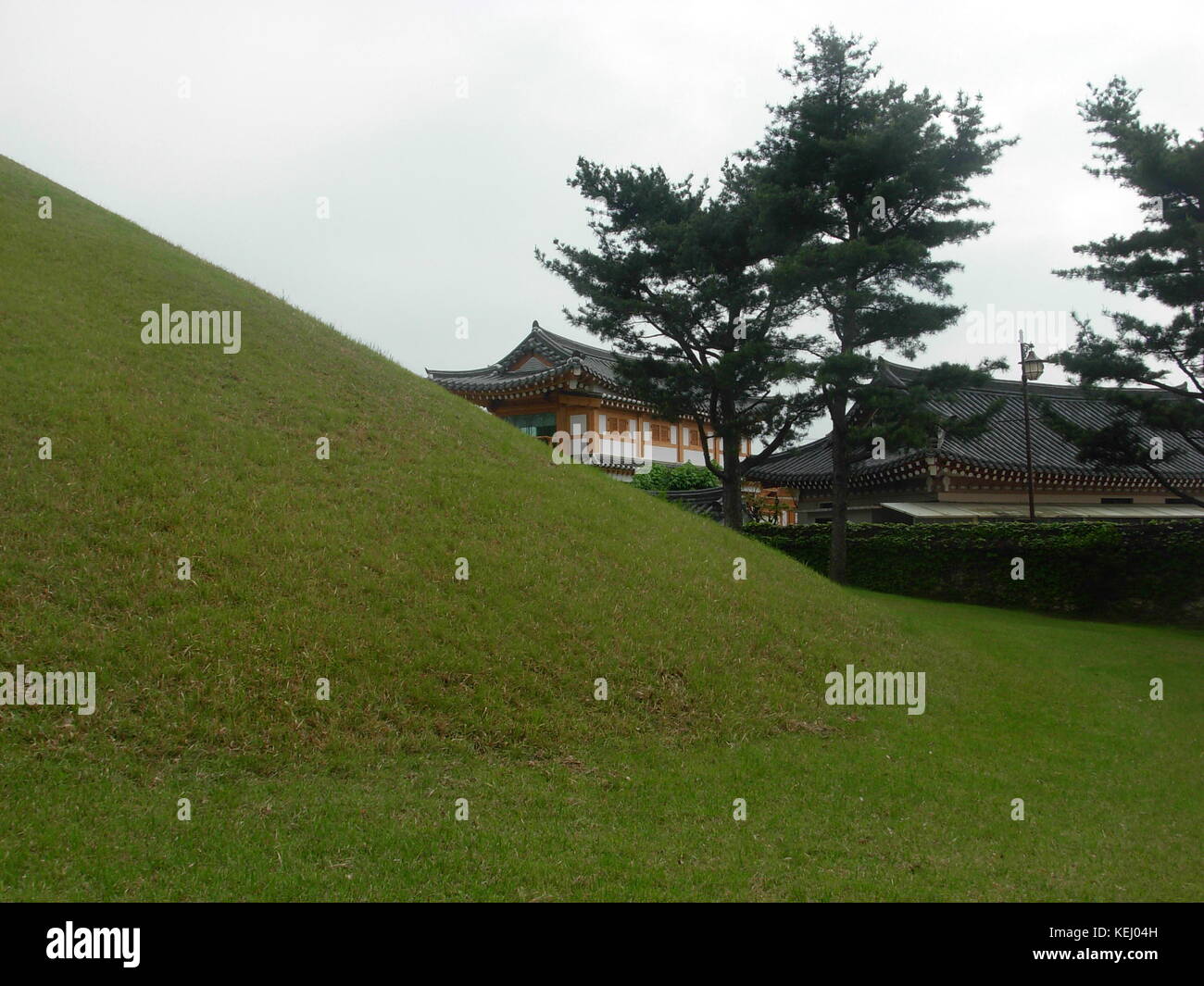 Traditional korean buildings inside royal Tumuli park in Gyeongju ...