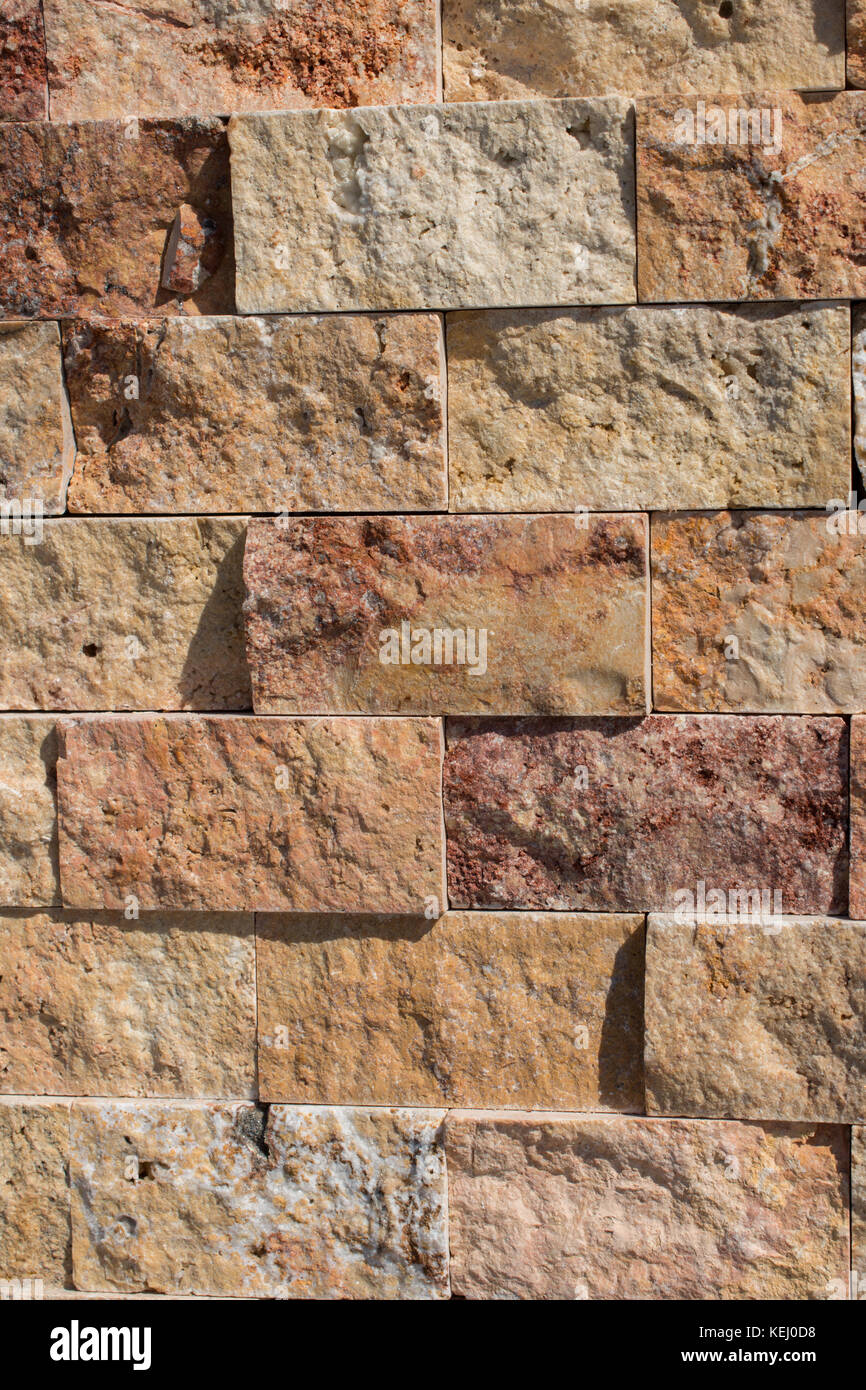 Decorative cubic stone wall as background texture Stock Photo - Alamy