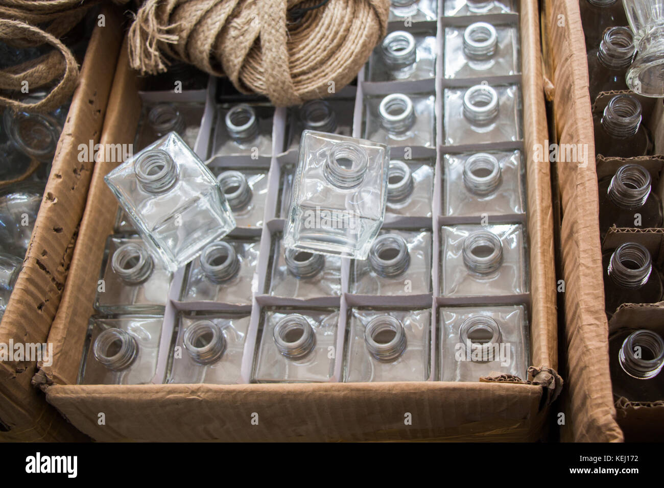 Set of Empty small transparent bottles in a box Stock Photo - Alamy