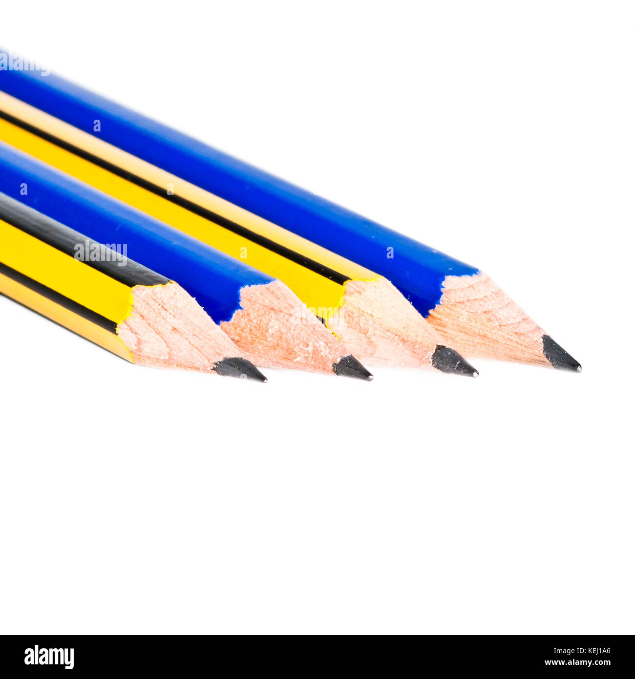 Four pencils shot against a white background Stock Photo - Alamy