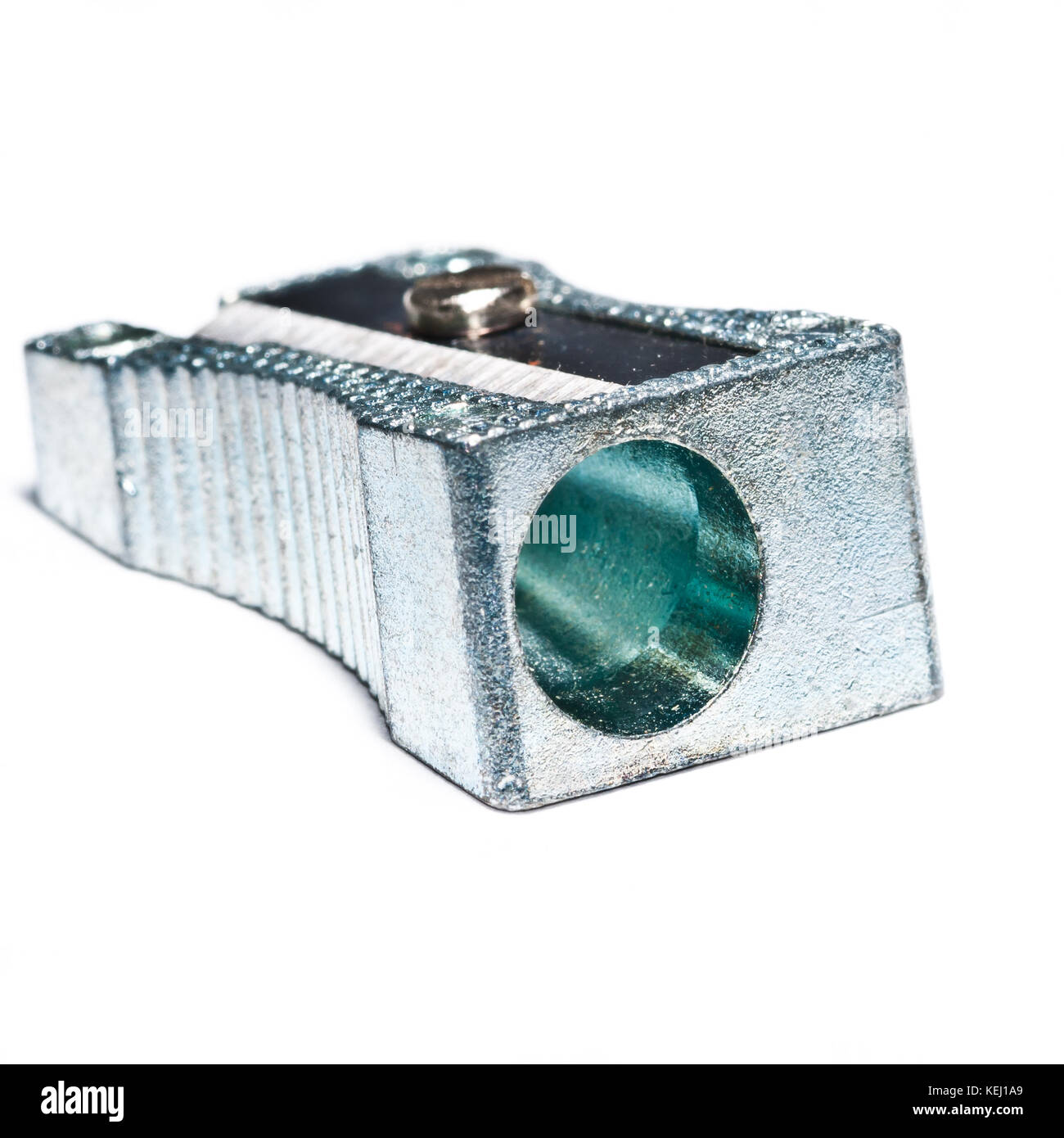 A metal pencil sharpener shot against a white background Stock Photo ...