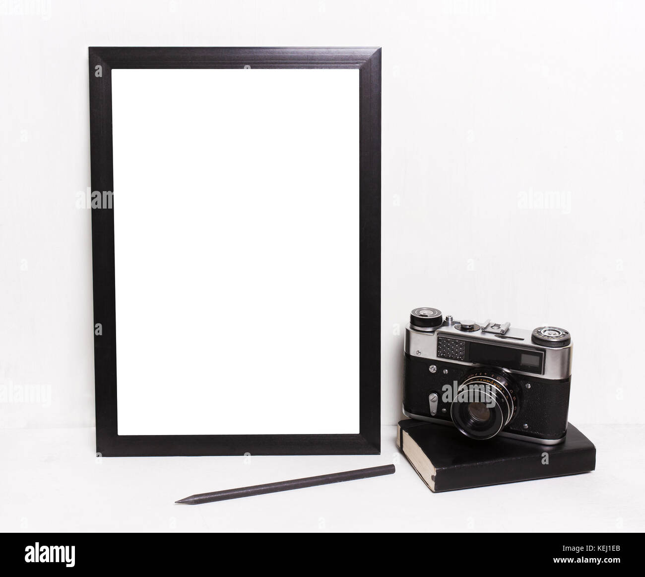 Blank black picture frames on on white background ,Vintage camera ...