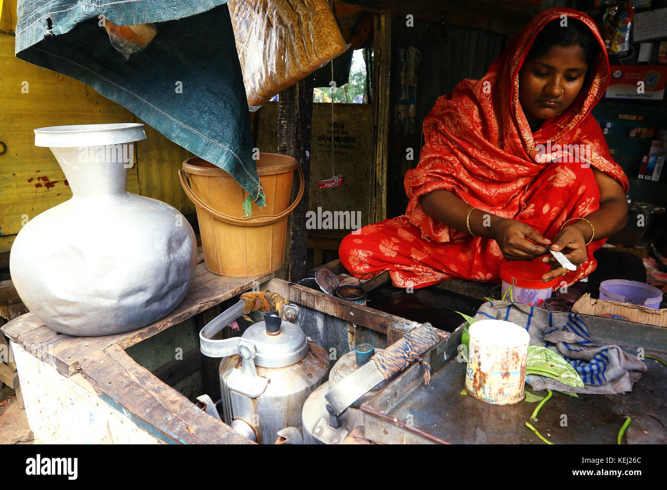 Poor Rural Woman in Her Tea Shop in Dhaka Stock Photo - Alamy