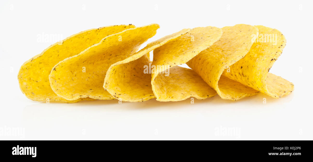 Six empty taco shells spooning. Isolated Stock Photo - Alamy