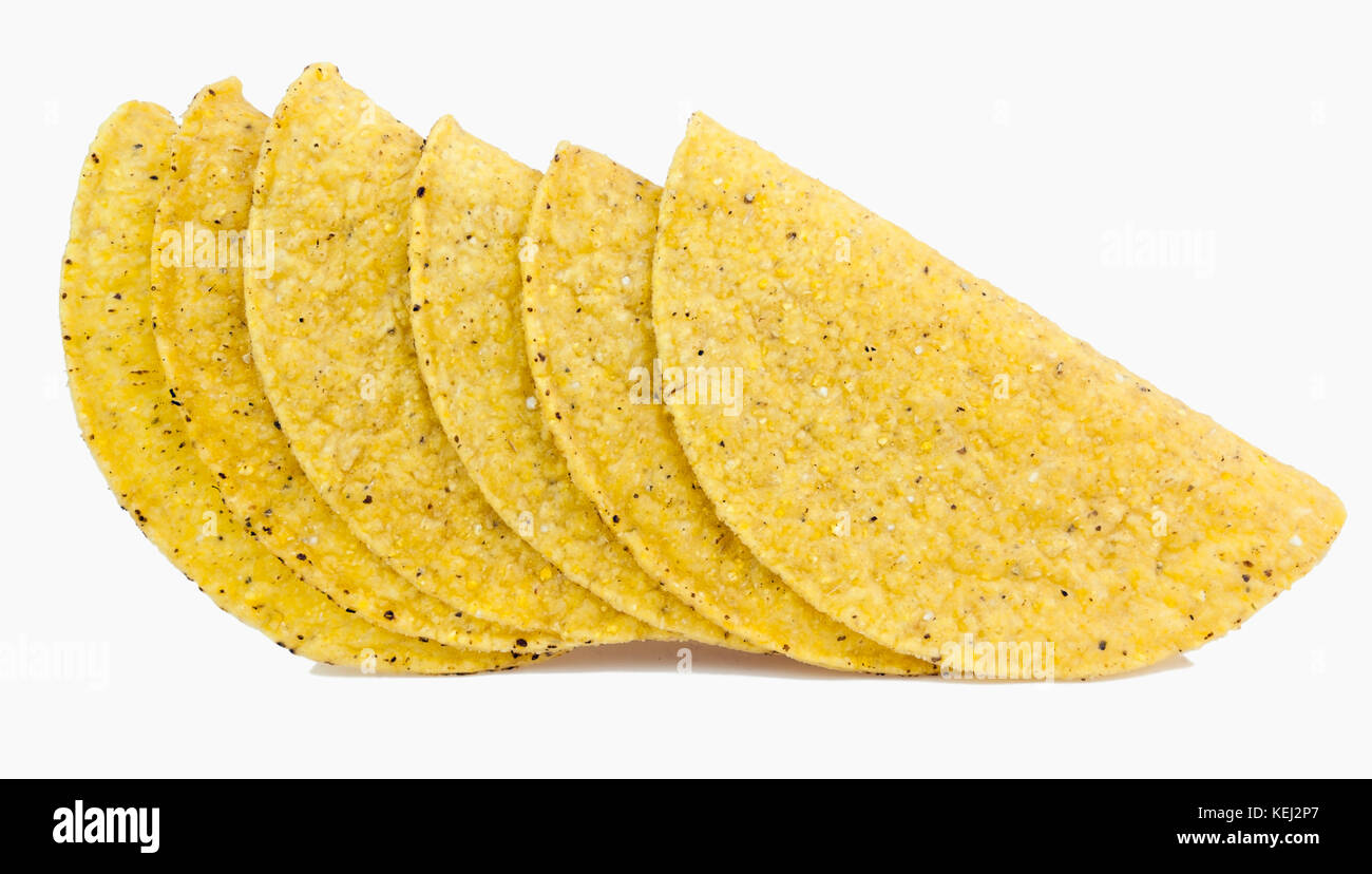 Six empty taco shells spooning. Isolated Stock Photo - Alamy