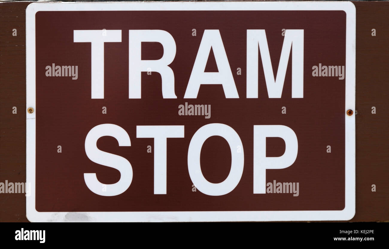 Brown TRAM STOP sign Stock Photo - Alamy