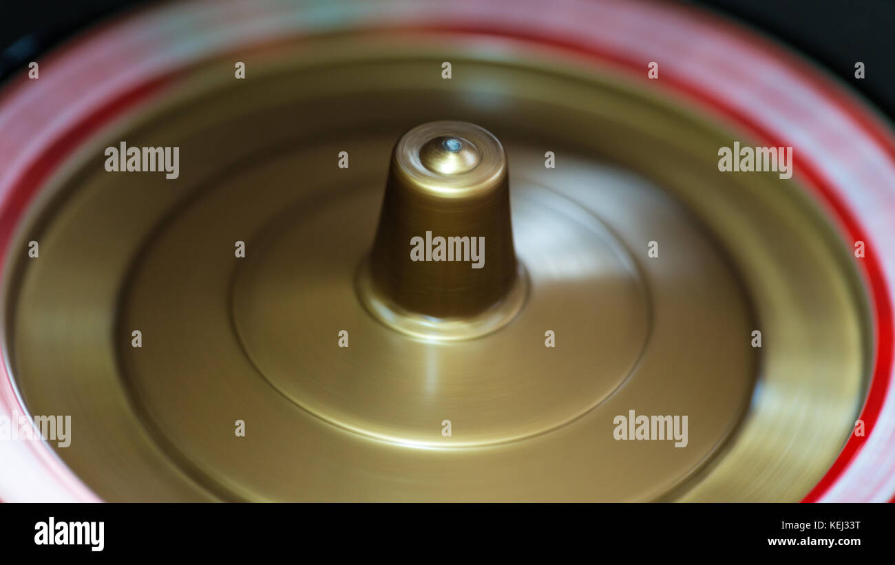 A macro shot of a spinning toy roulette wheel Stock Photo - Alamy