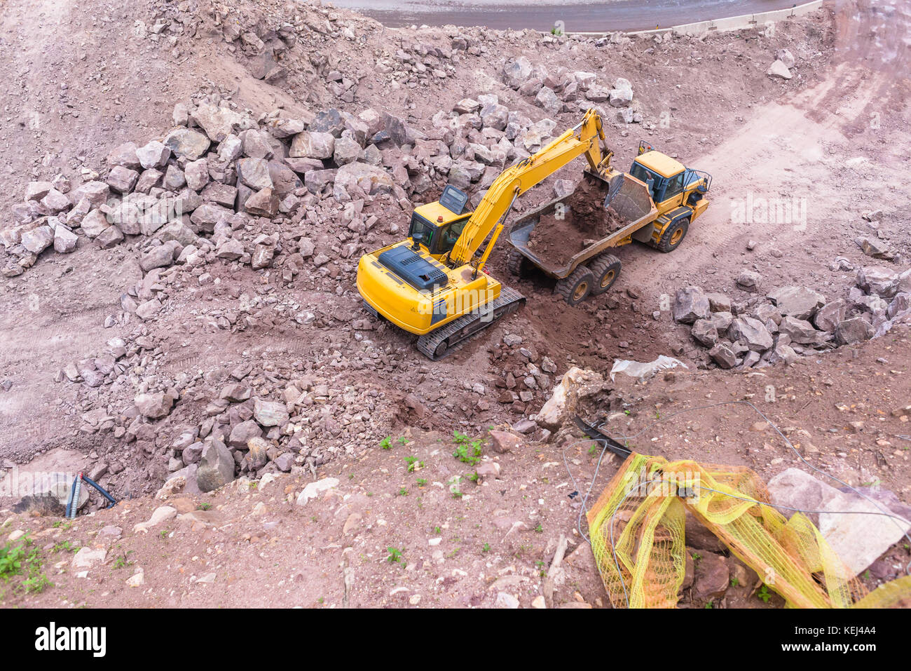 Industrial excavator machine loading construction truck vehicle heavy ...