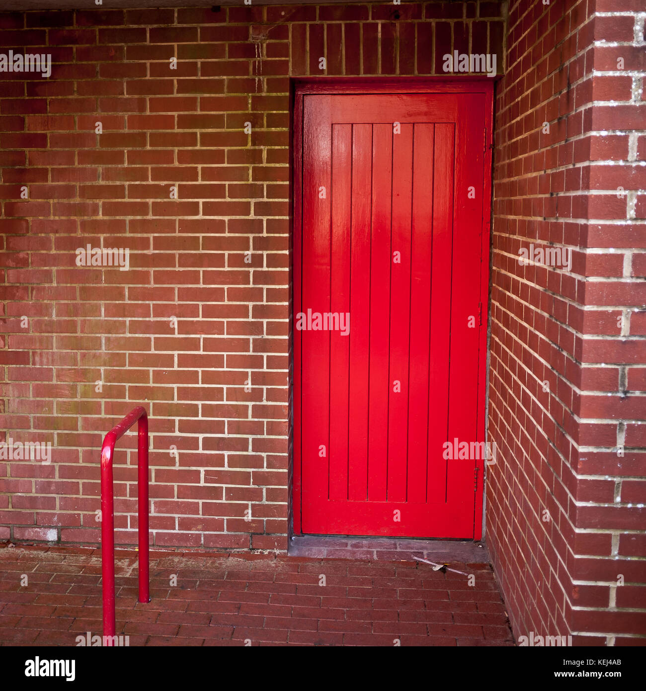 A bright red painted door Stock Photo - Alamy