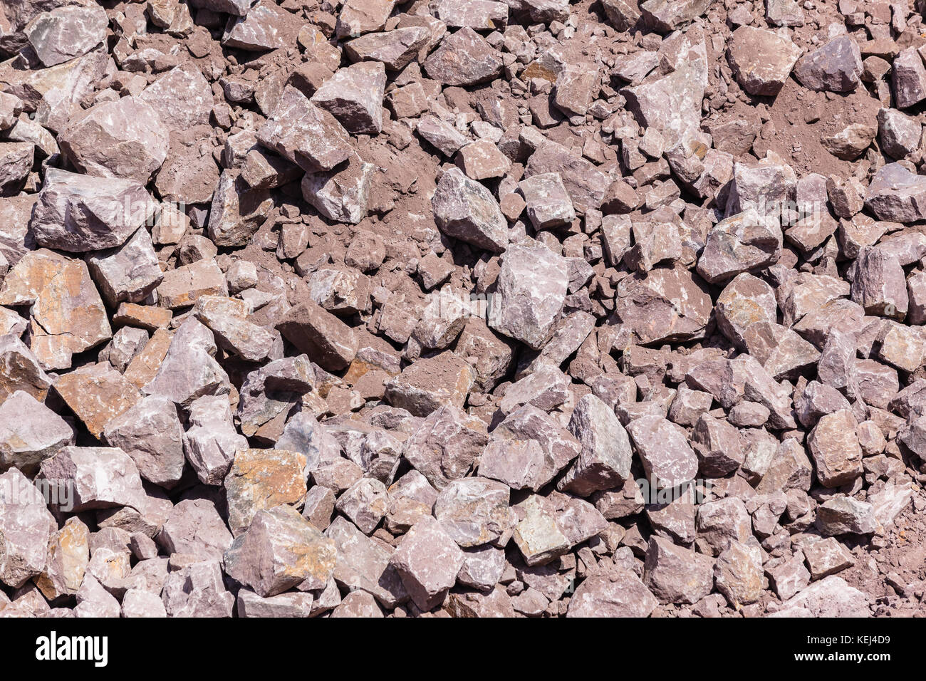 Industrial earthworks blasting rocks spread closeup textures background ...