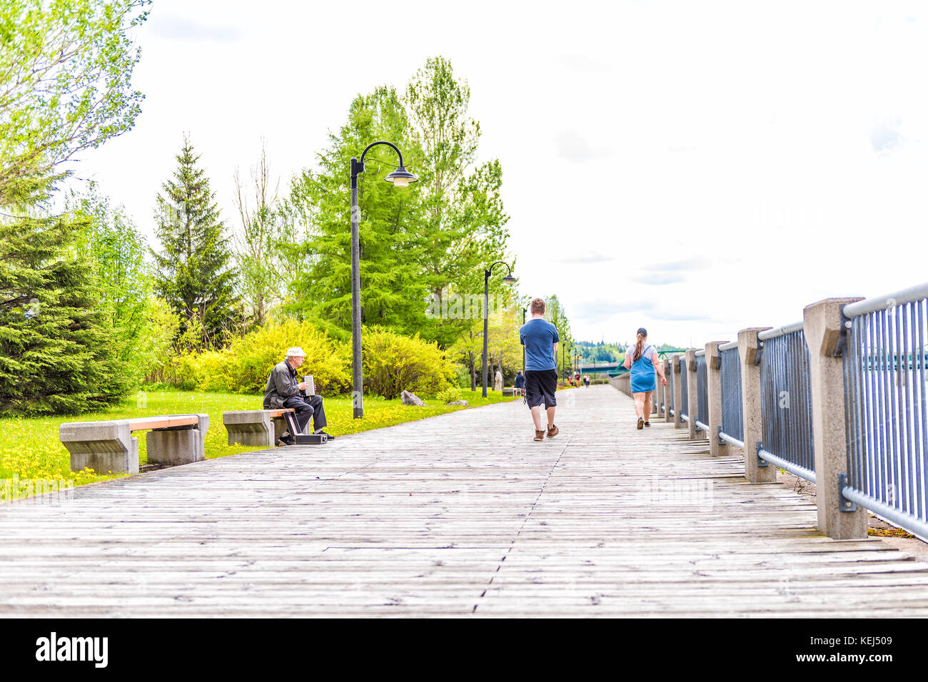 Saguenay, Canada - June 3, 2017: Sidewalk terrace boardwalk in downtown ...