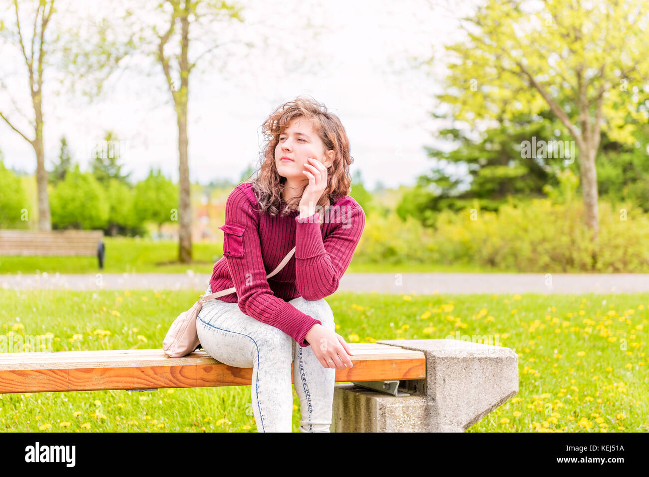 Hand resting on cheek hi-res stock photography and images - Alamy