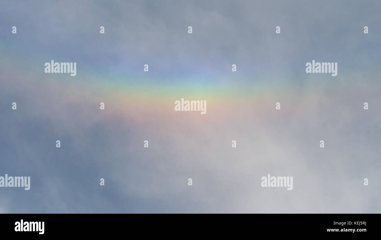 A shot of a weather phenomenon known as cloud irridescence Stock Photo ...