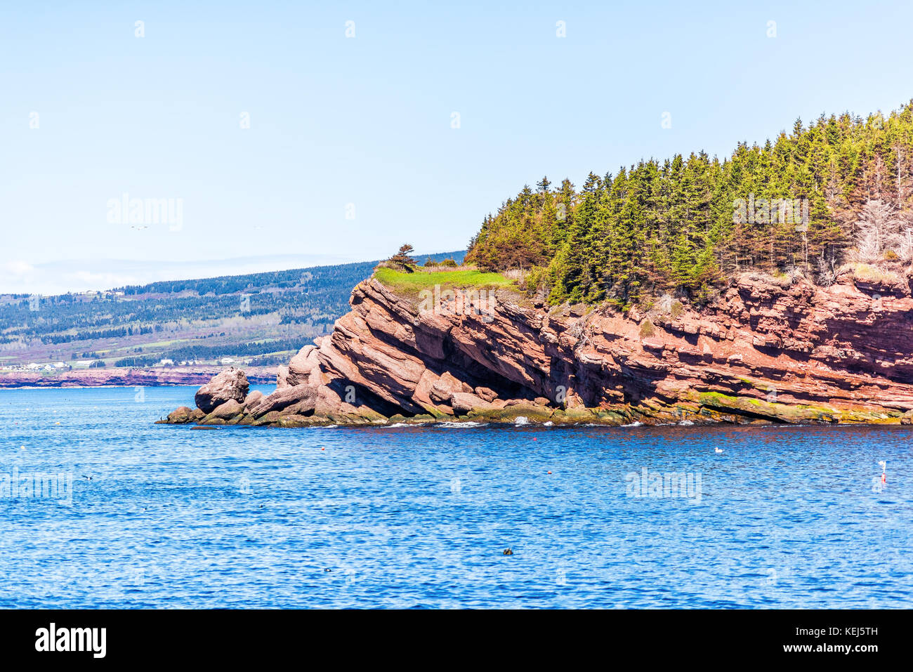 Edge of green Bonaventure island cliff in Perce, Gaspesie, Gaspe region ...