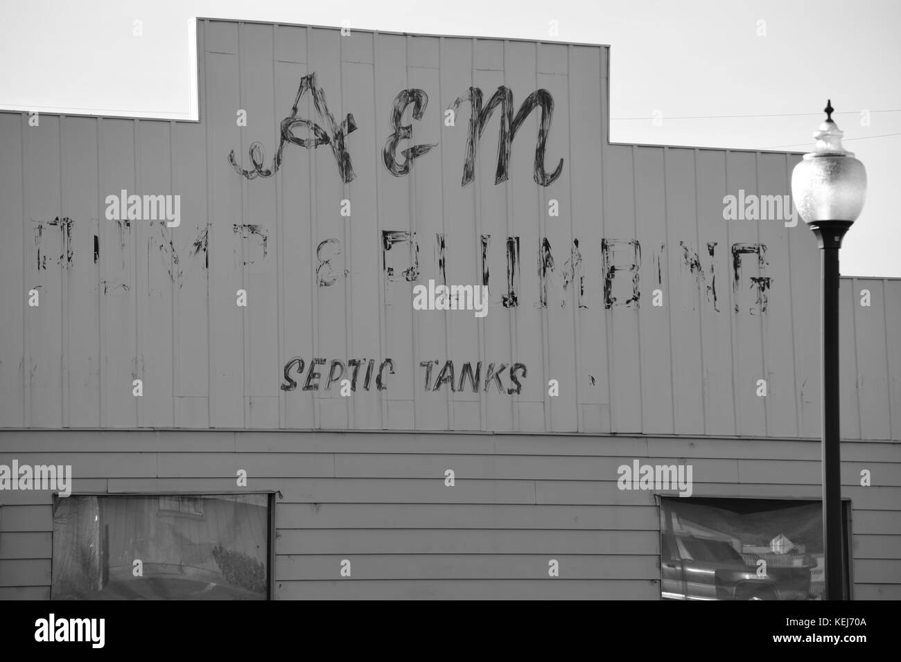Old neglected wooden business facade Stock Photo - Alamy