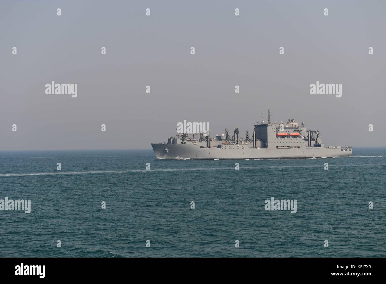 The Military Sealift Command dry cargo and ammunition ship USNS ...