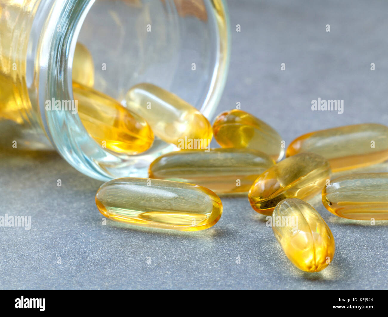 Close up capsules fish oil in Glass bottle .The supplement high vitamin ...