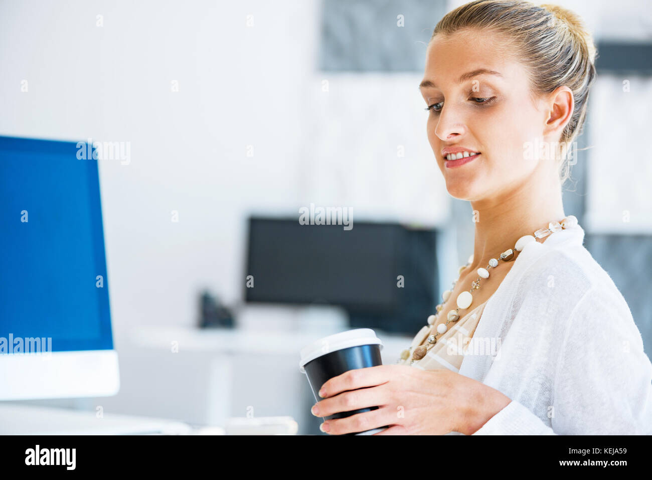 Elegant office worker Stock Photo - Alamy