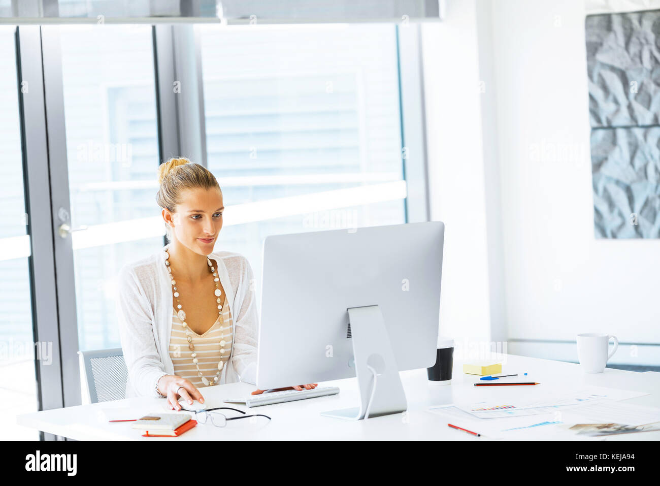 Elegant office worker Stock Photo - Alamy