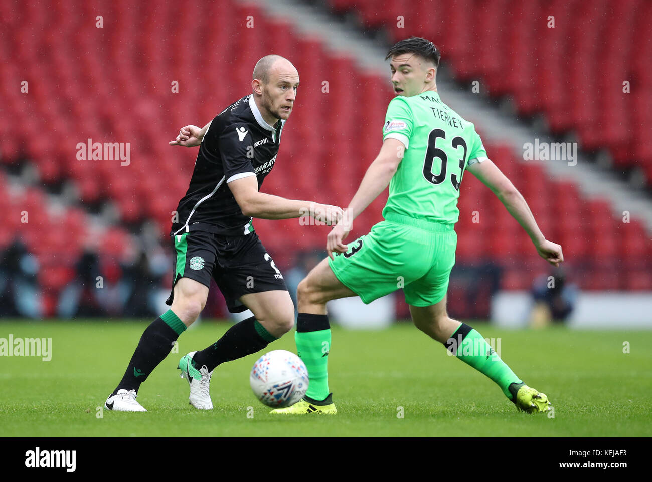 Hibernian's David Gray (left) and Celtic's Kieran Tierney battle for ...
