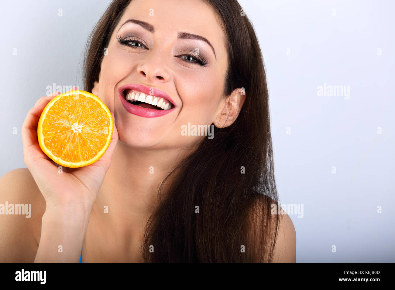 Beautiful toothy laughing emotional brunette woman with healthy skin ...
