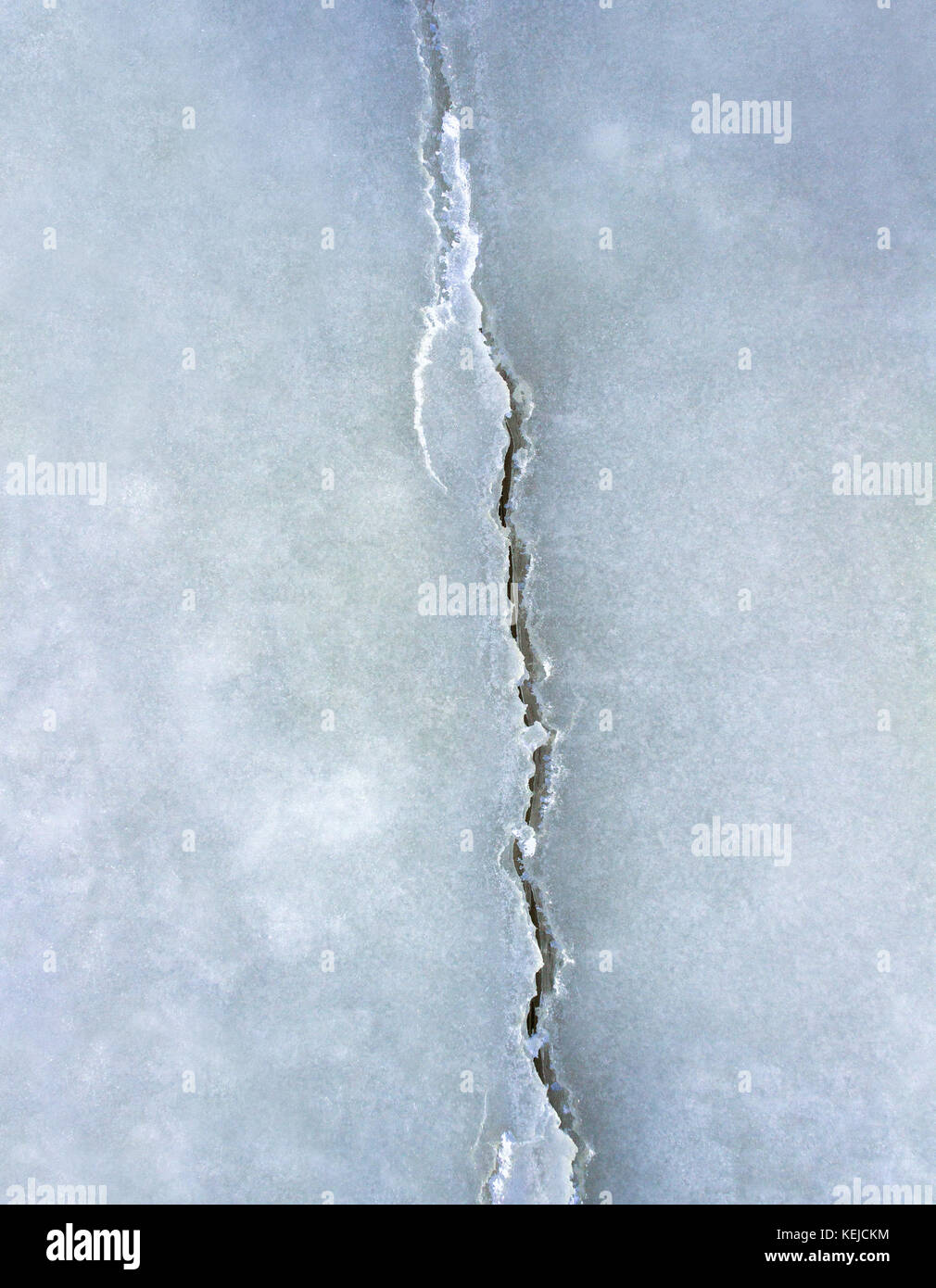 Crack in the ice surface Stock Photo - Alamy