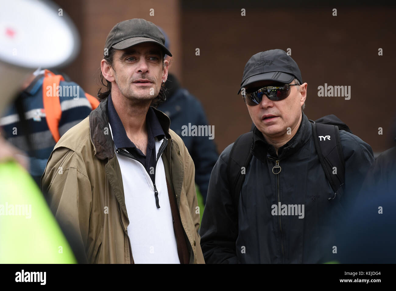 English Defence League (EDL) leader Ian Crossland (left) takes part in ...