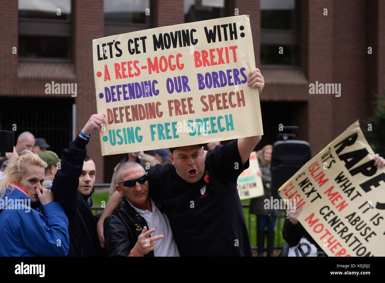 People take part in an English Defence League (EDL) march Peterborough ...