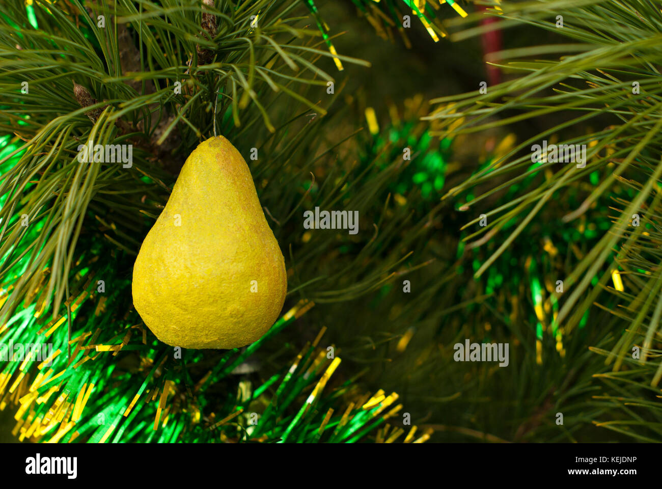retro Christmas ornament - yellow pear of papier-mâché - on a ...