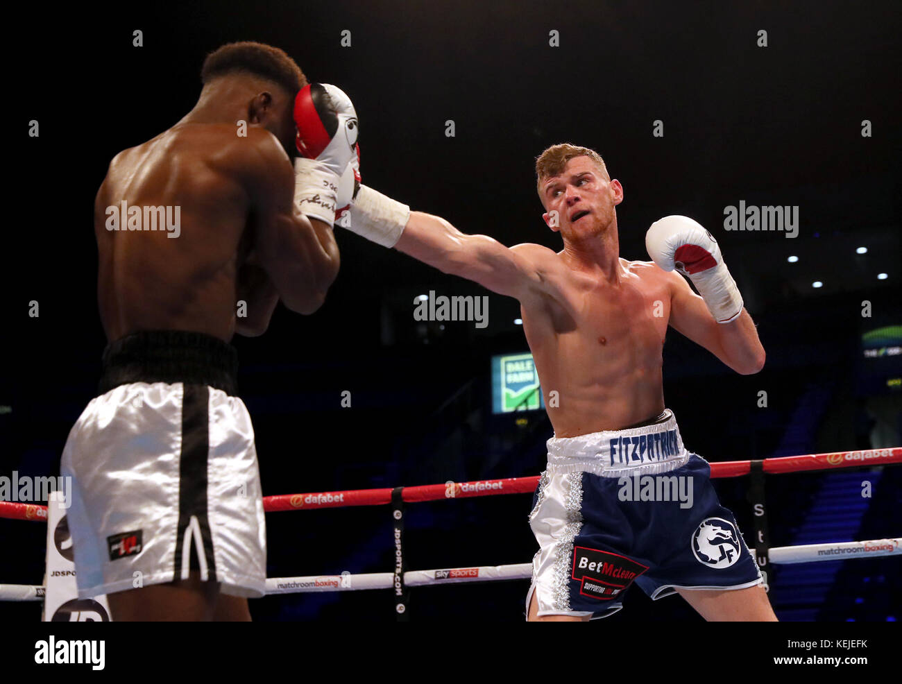 Joe Fitzpatrick (right) and Mwenya Chisanga in action during their ...