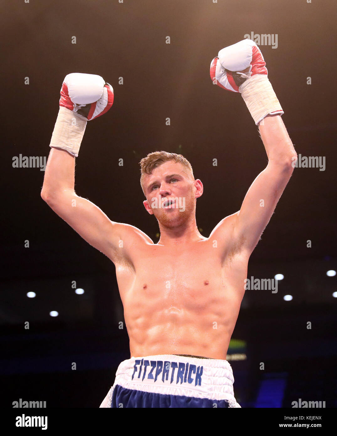 Joe Fitzpatrick celebrates beating Mwenya Chisanga during their ...