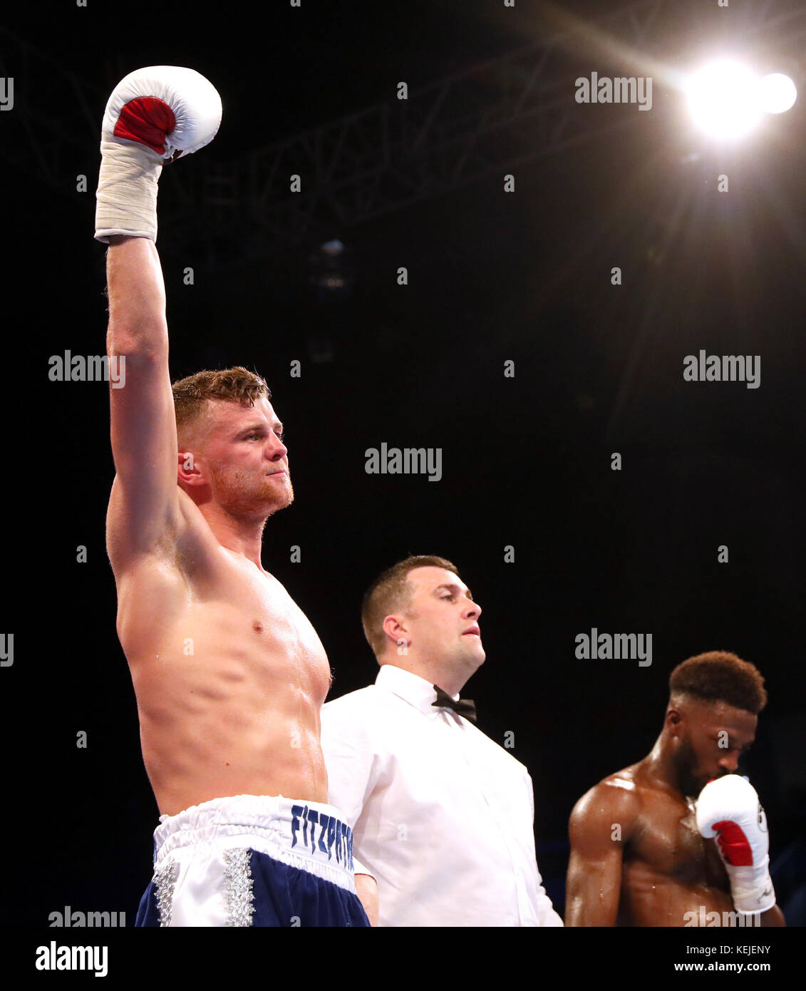 Joe Fitzpatrick celebrates beating Mwenya Chisanga during their ...