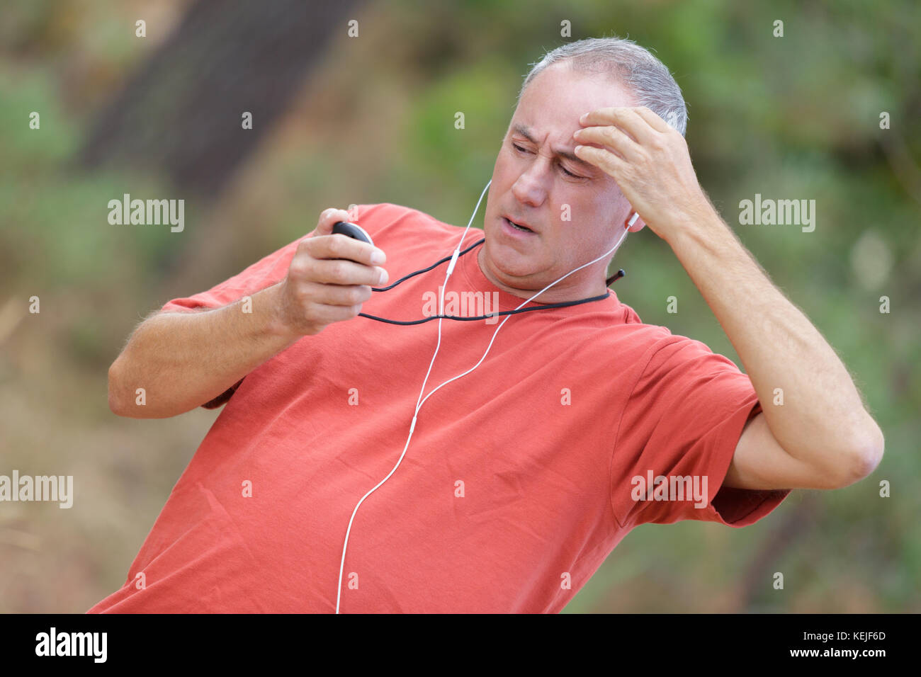 runner checking his heart rate pulse during workout Stock Photo - Alamy