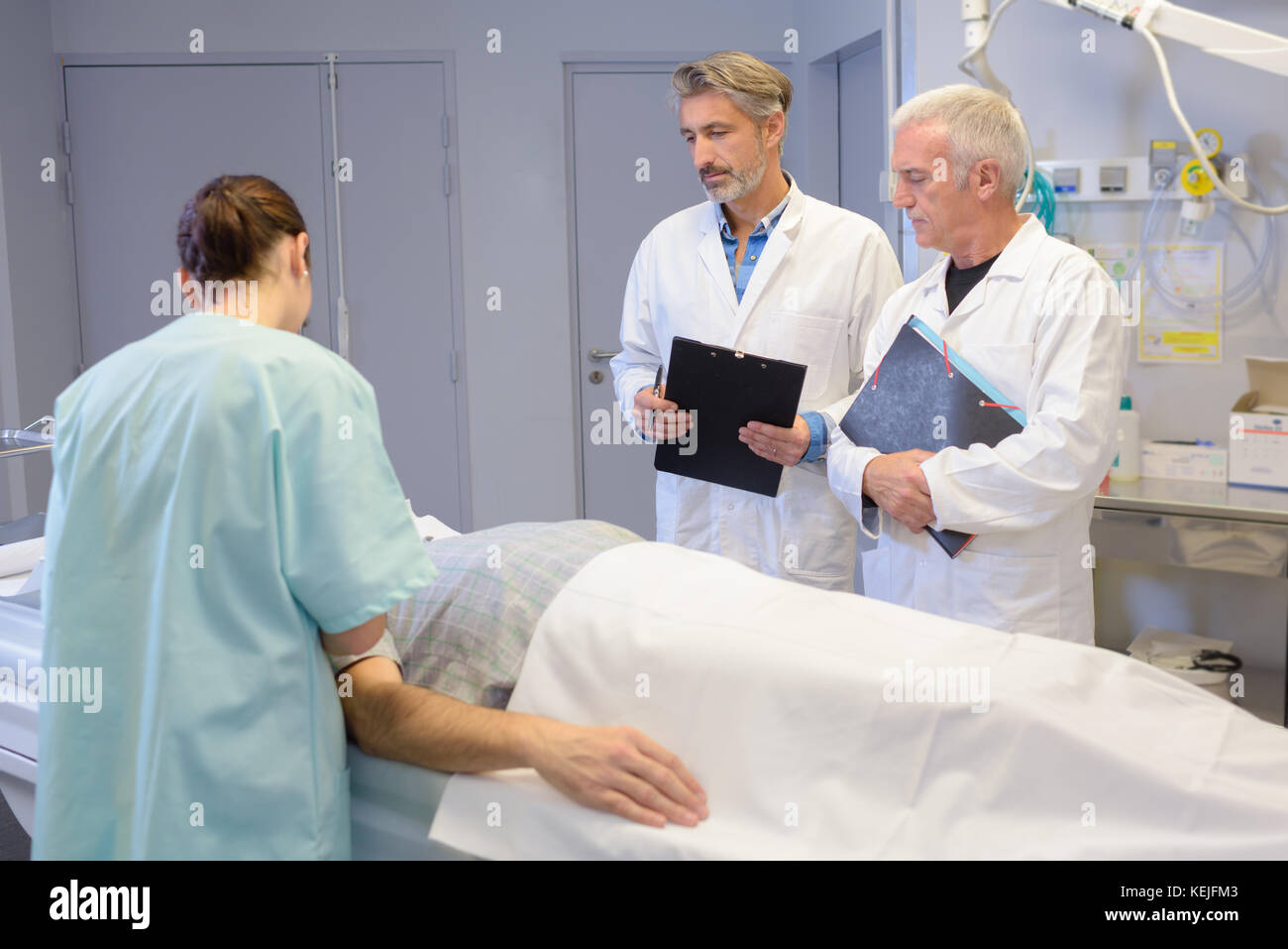 team of healthcare provider and a patient Stock Photo - Alamy